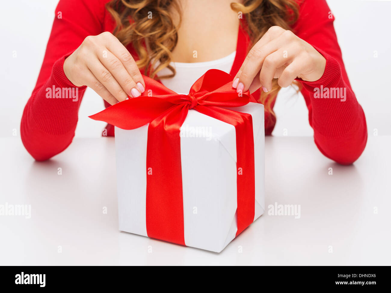 woman hands opening gift boxes Stock Photo - Alamy