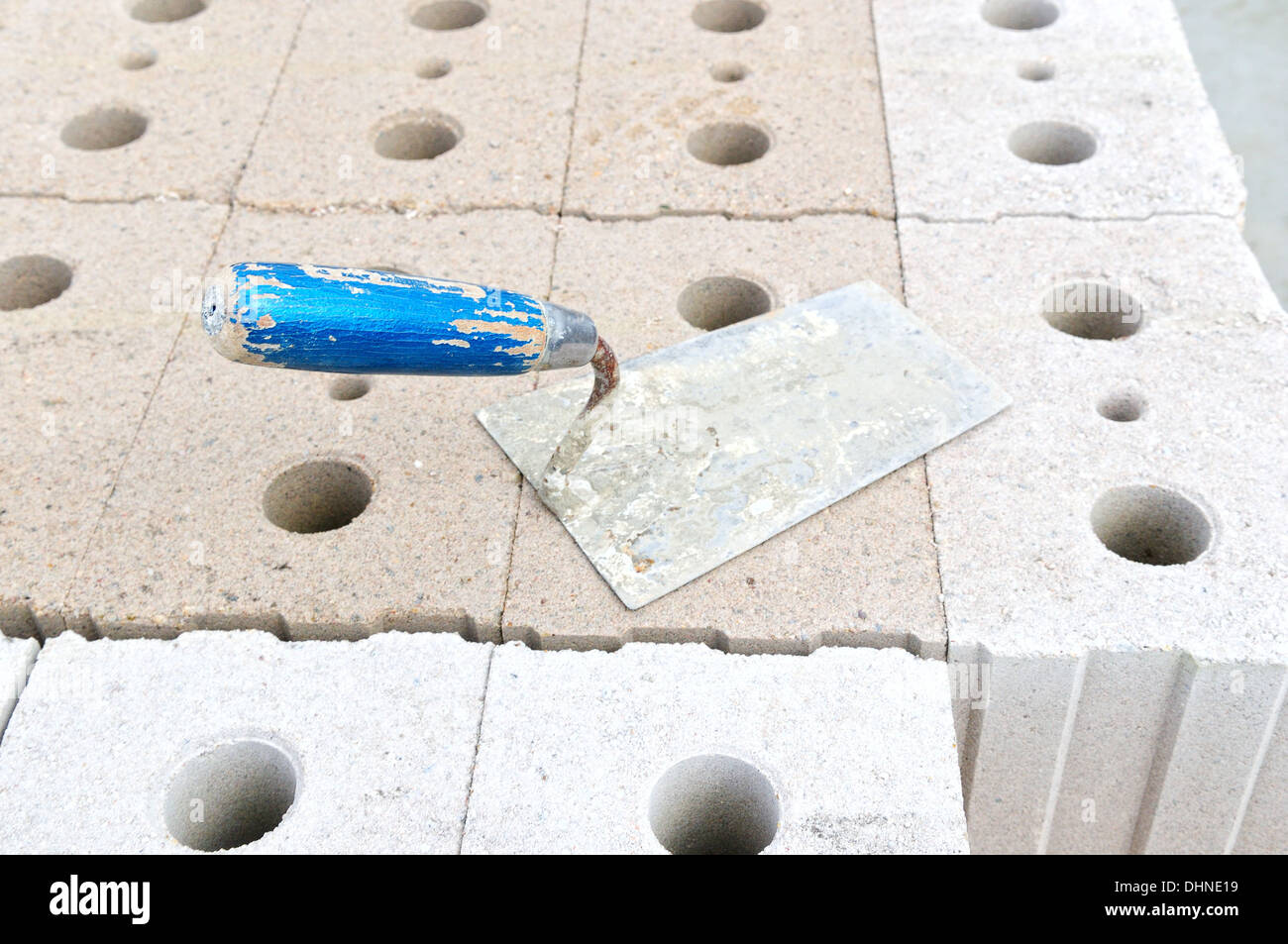 very traditional trowel and bricks Stock Photo - Alamy
