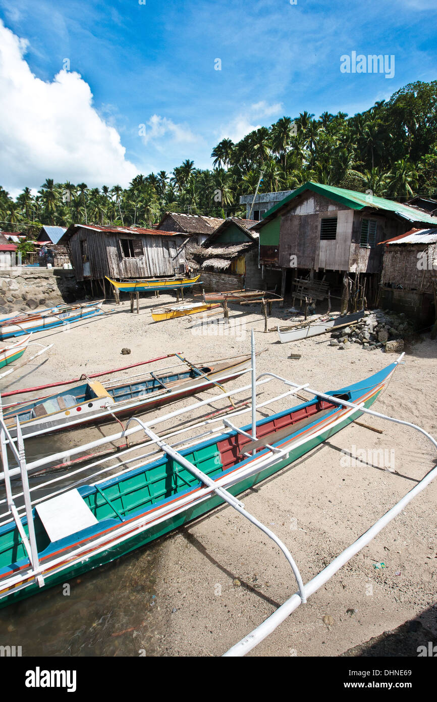 Panboats line the shore of a remote village on the island of Samar ...