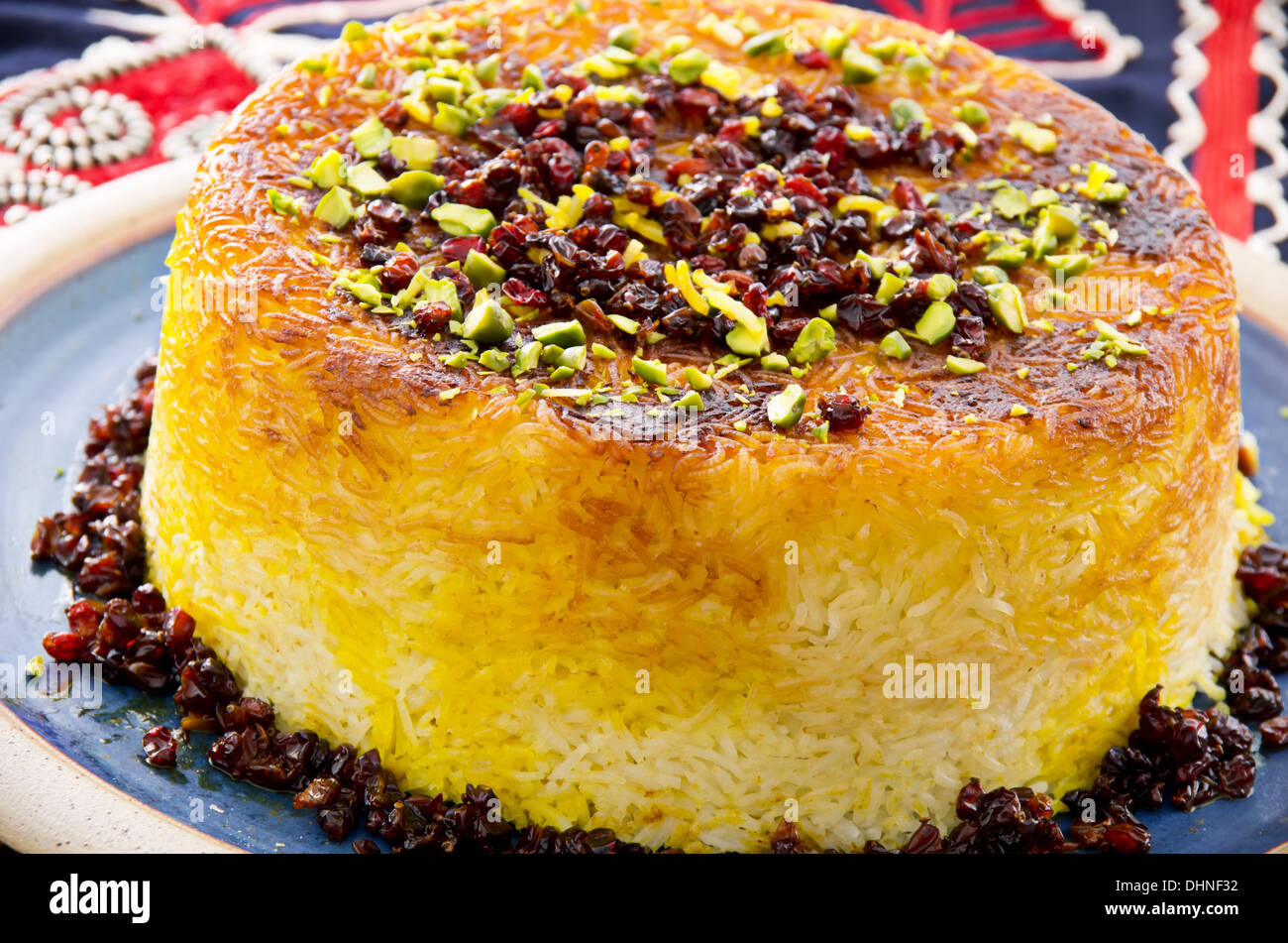 Tahcin on the blue plate Stock Photo - Alamy