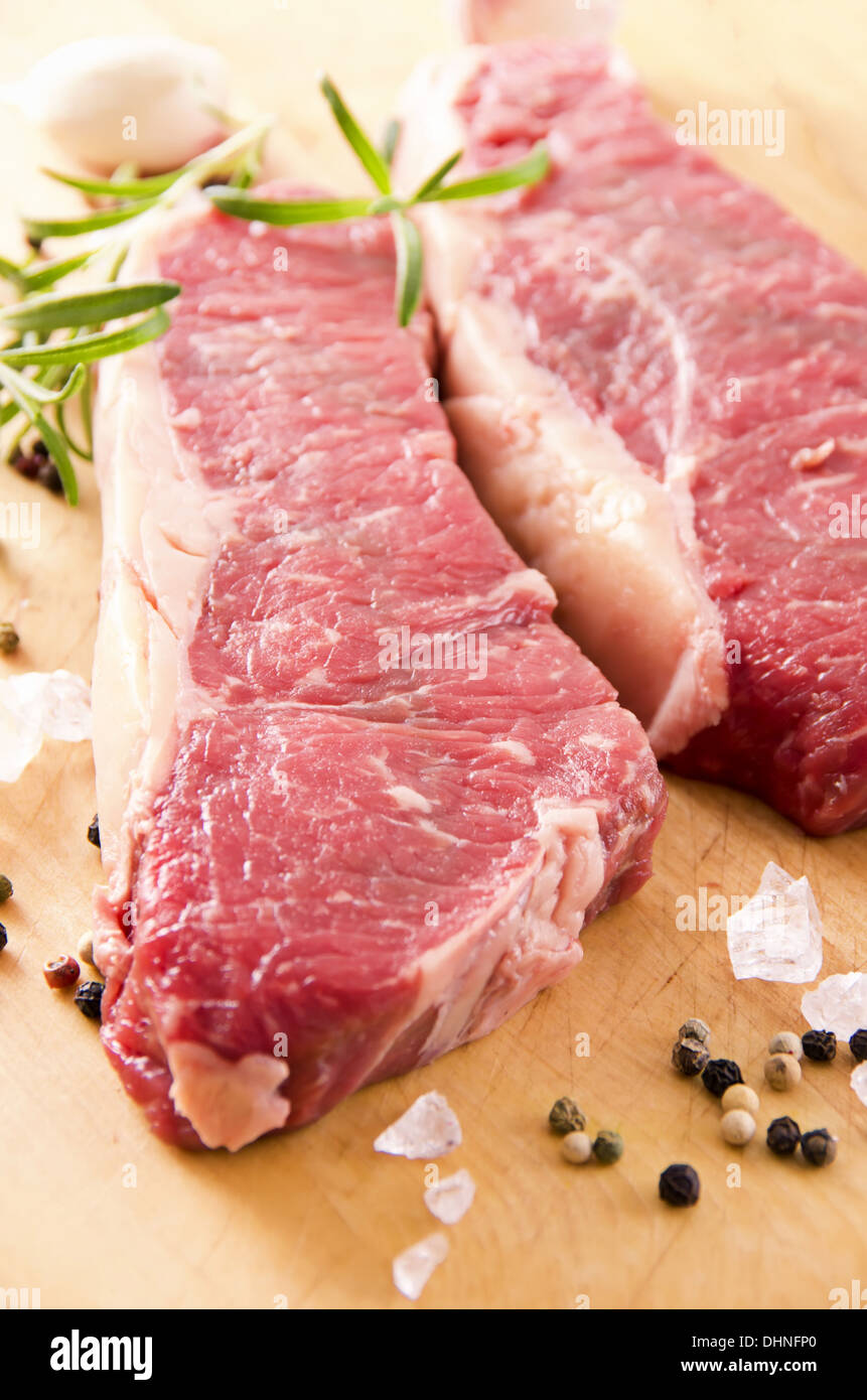 rib eye beef steaks with herbs Stock Photo - Alamy