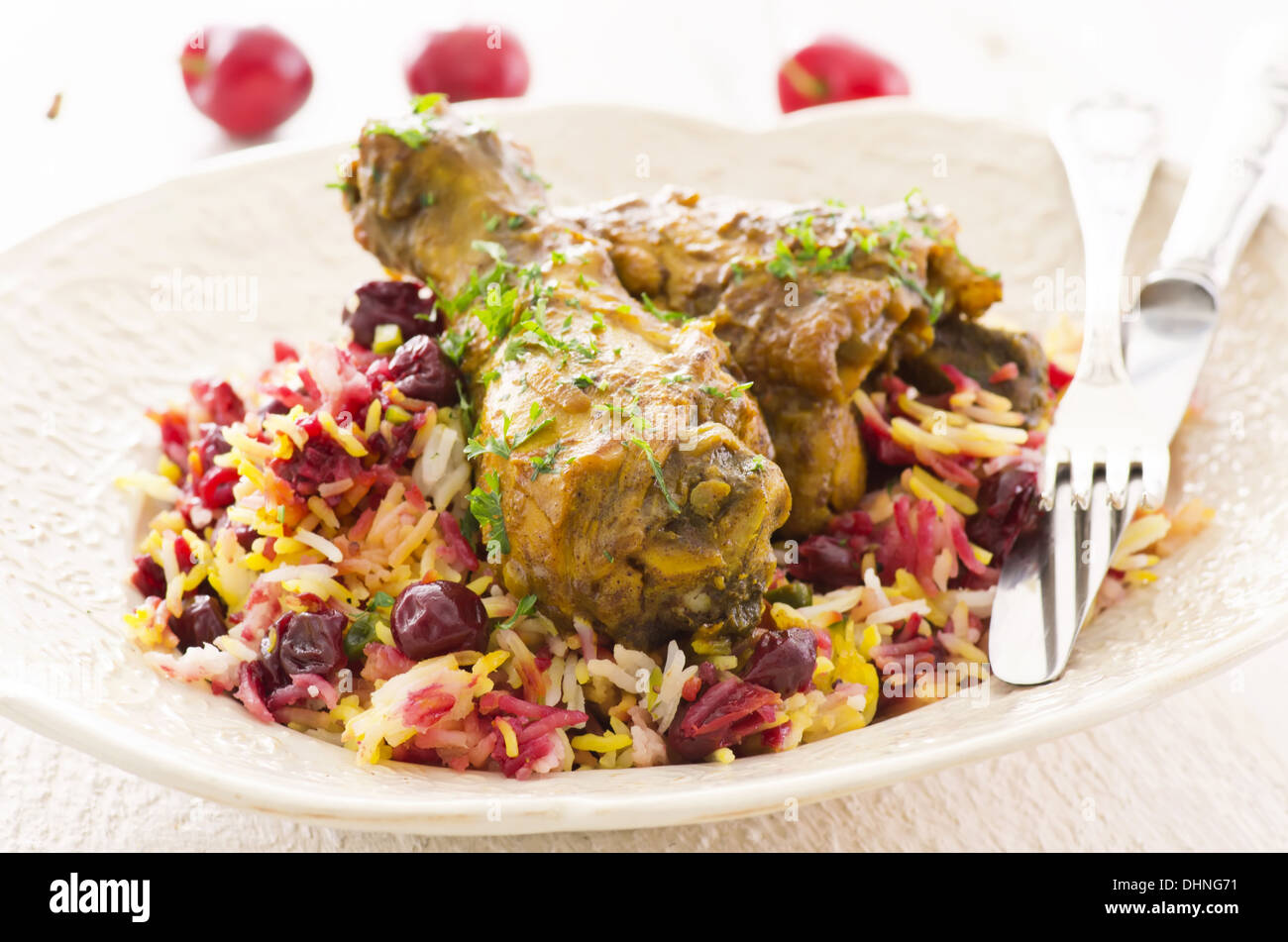 chicken with saffron rice and sour cherries Stock Photo - Alamy