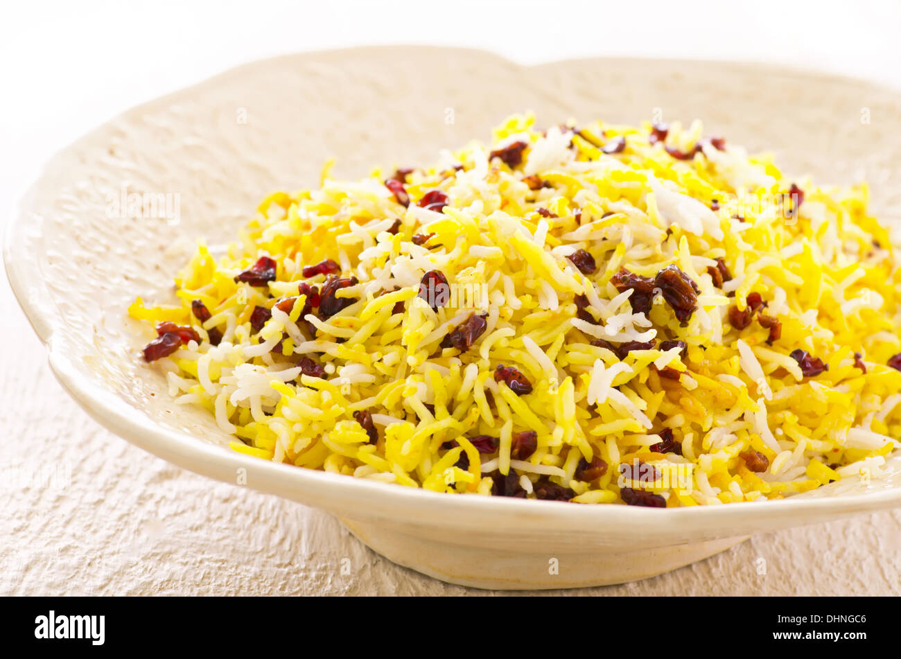 Persian sereshk polo rice with berberis Stock Photo - Alamy