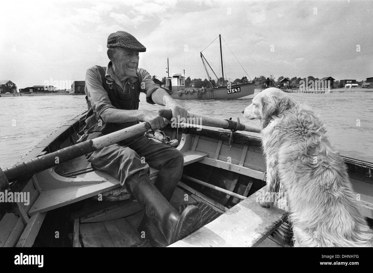 Southwold Ferry 1980s UK. Ferryman rowing travellers from Southwold ...