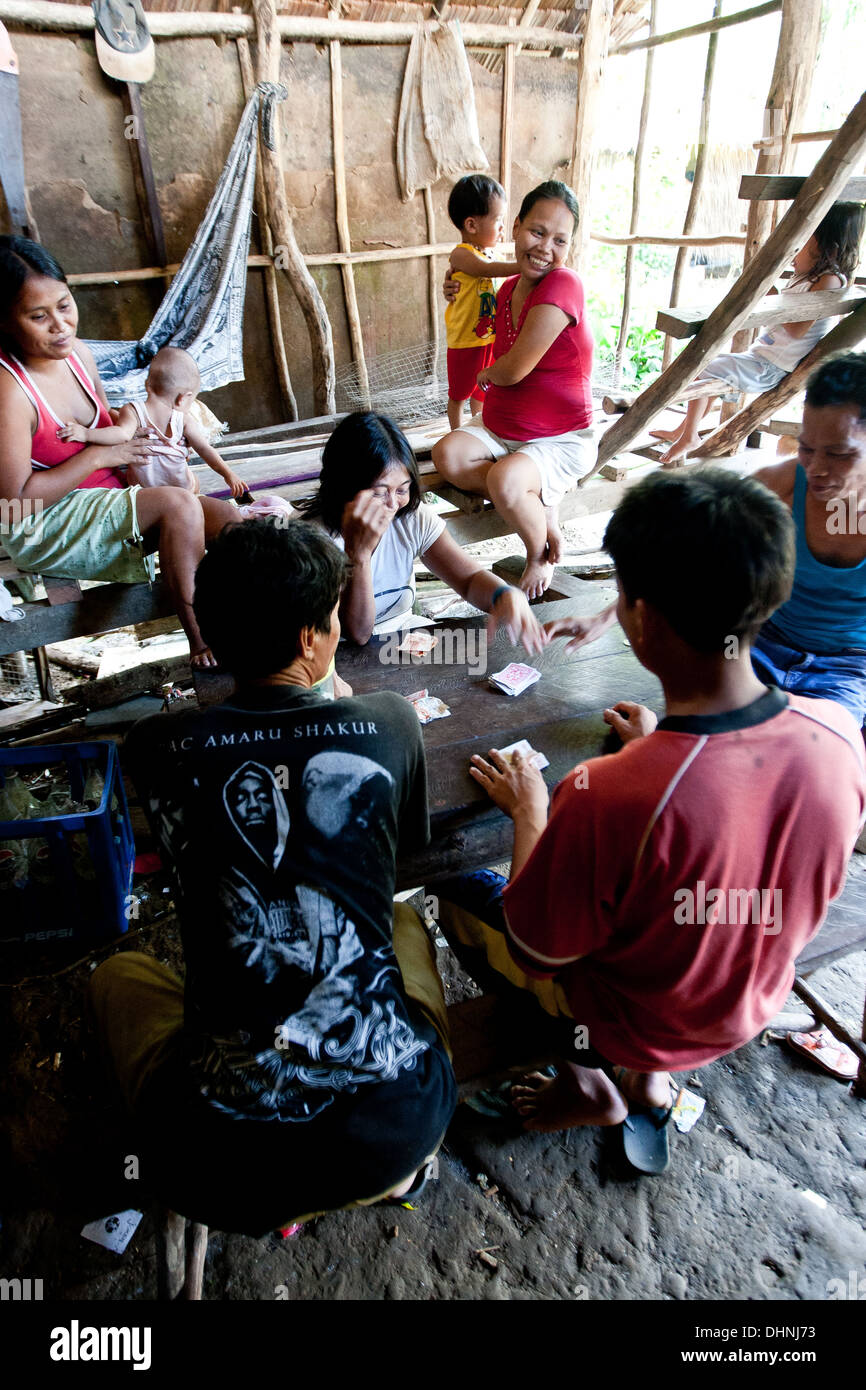 Local villagers play card games and gamble as a local pasttime on the ...
