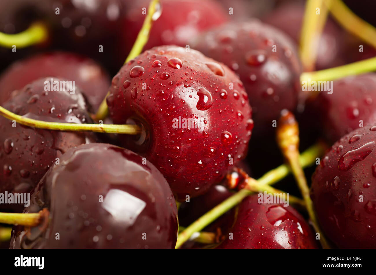 Sweet cherry background Stock Photo - Alamy