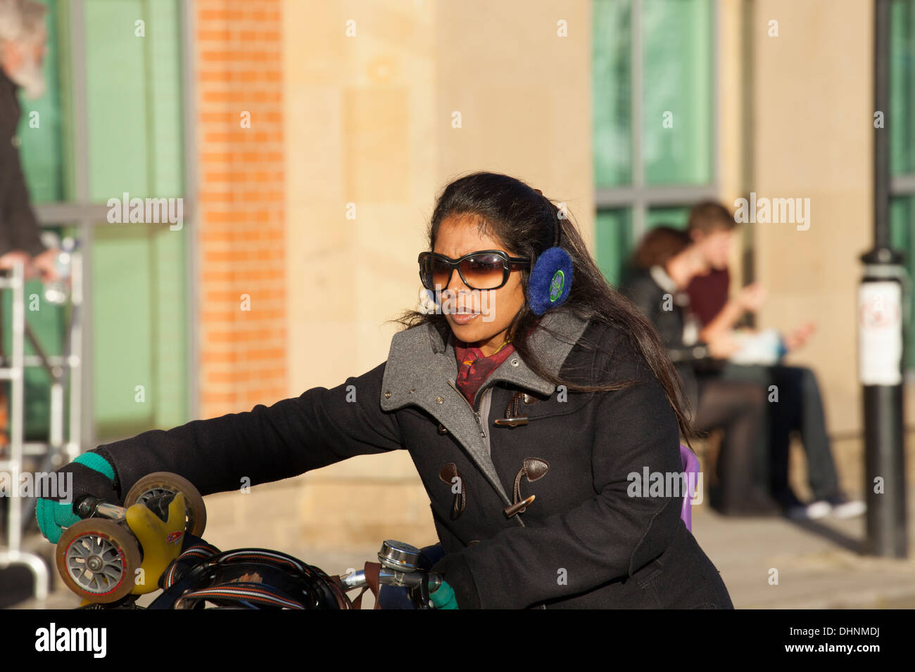Ear muffs and duffel coat hi-res stock photography and images - Alamy