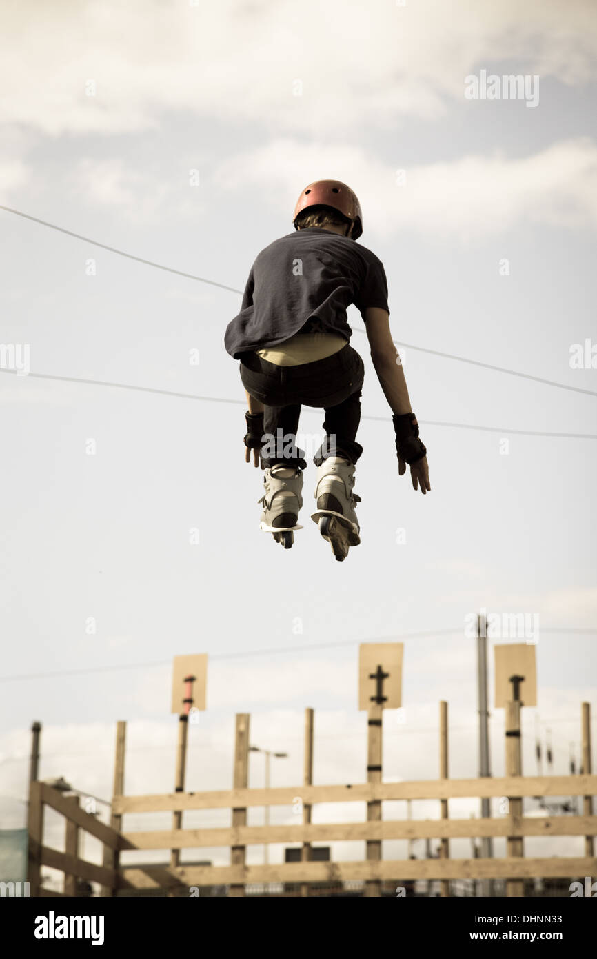 Teenager roller blading hi-res stock photography and images - Alamy