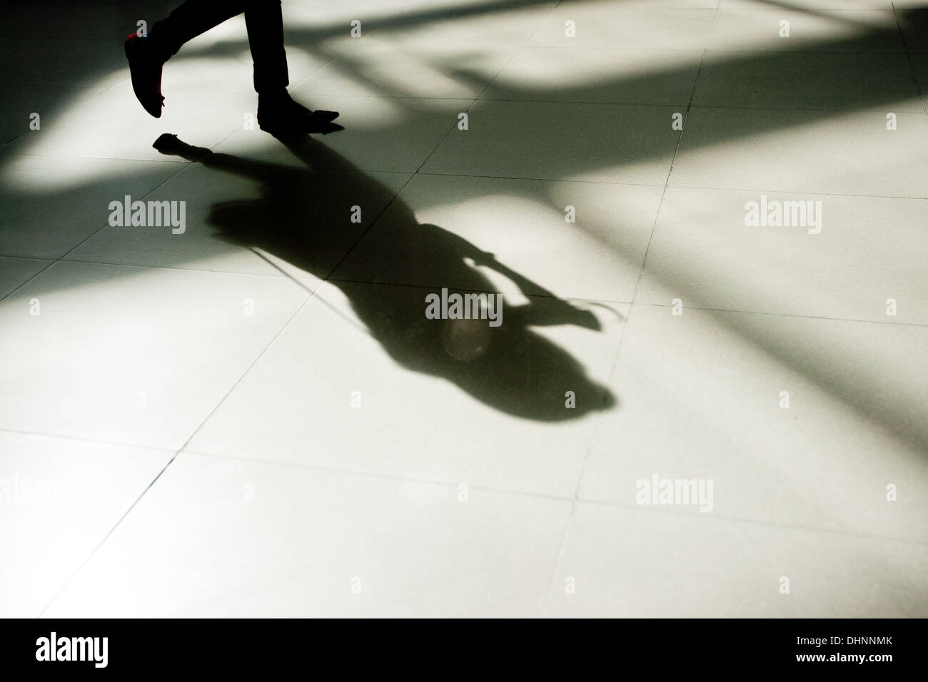 A shopper's shadow in one of Manila's largest shopping malls Stock ...