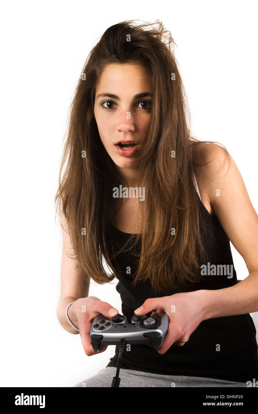 Teenage girl playing video games with a joystick Stock Photo - Alamy