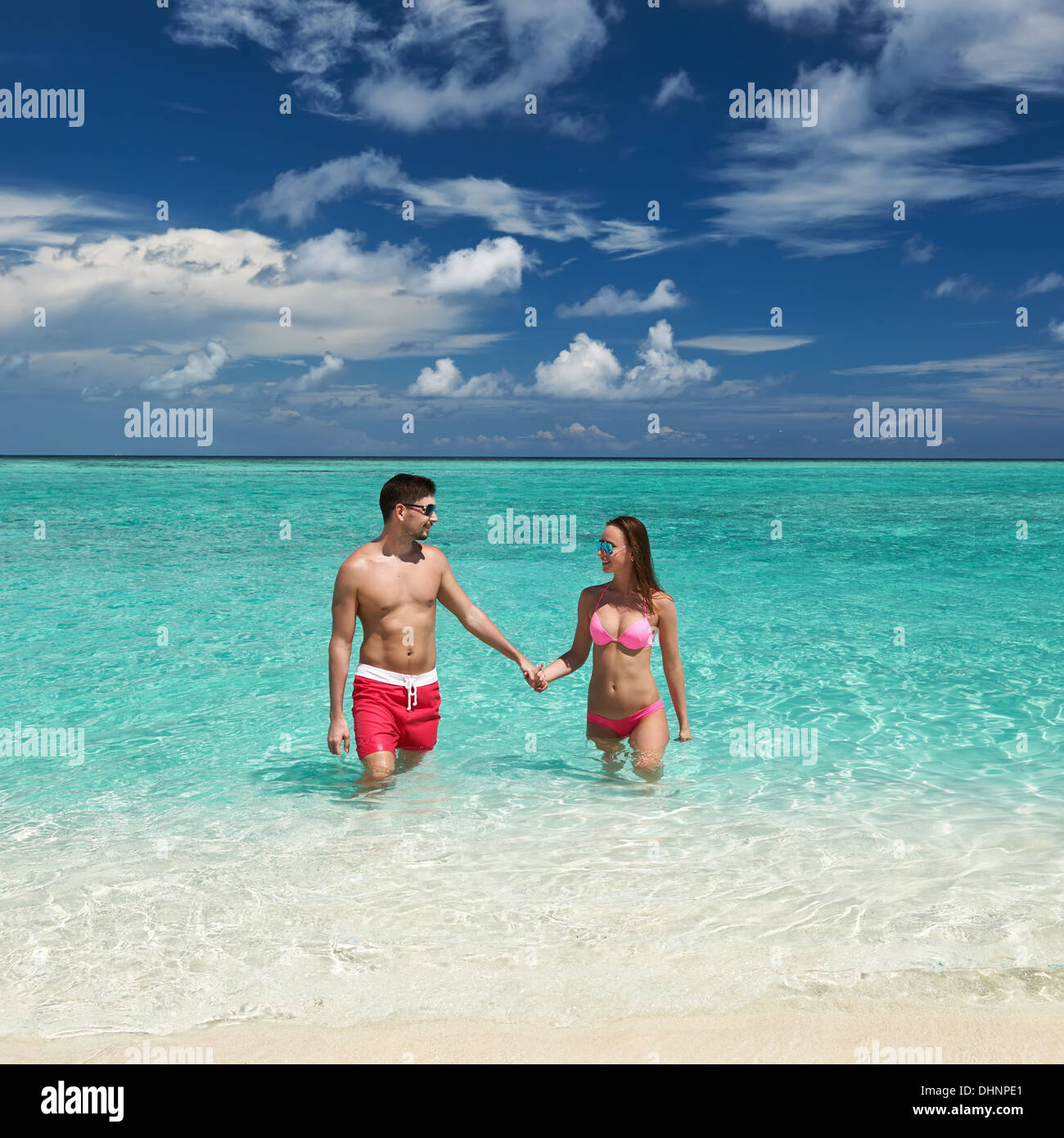 Couple on a beach at Maldives Stock Photo - Alamy