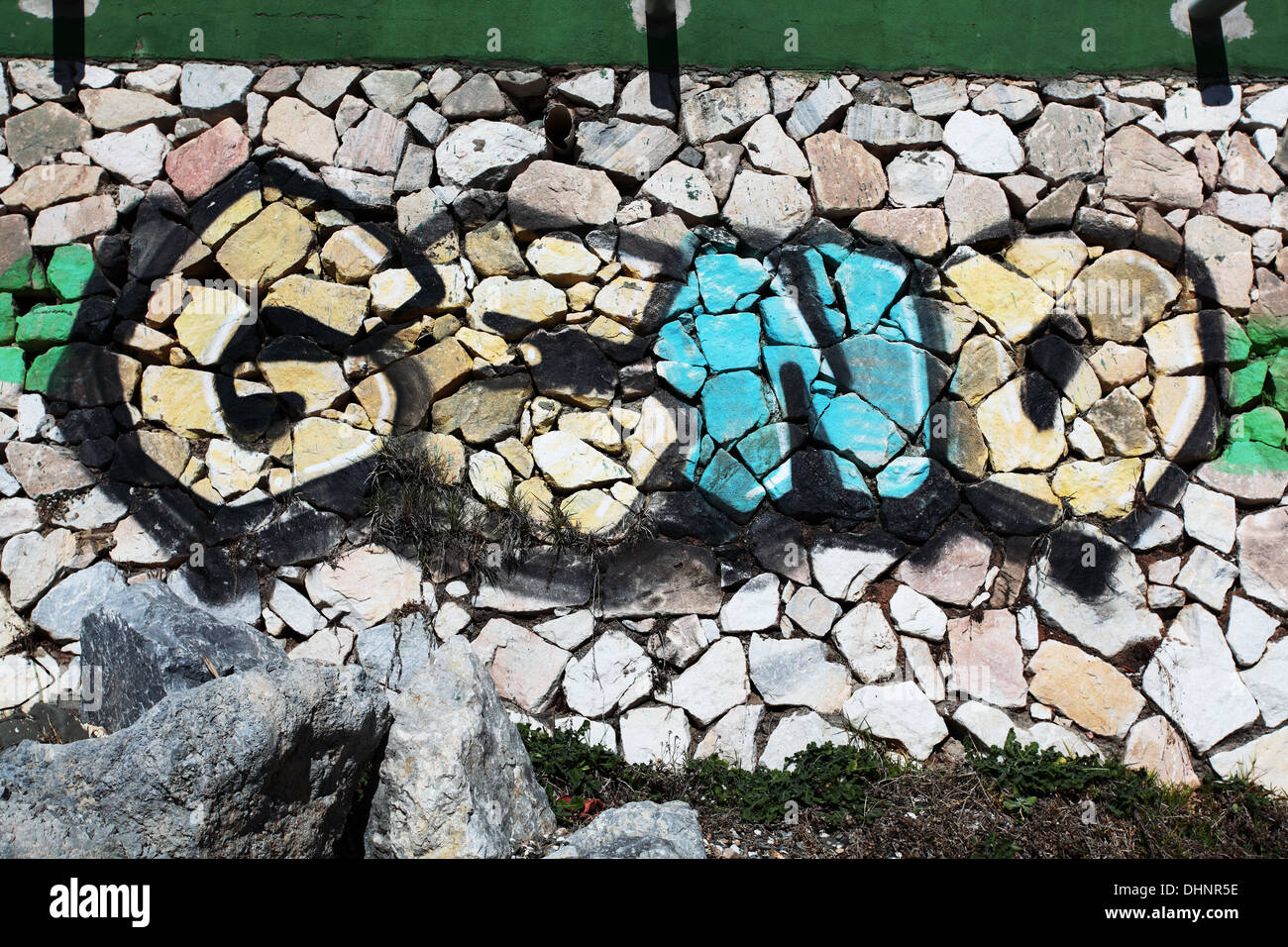 Graffiti on stone wall Stock Photo - Alamy