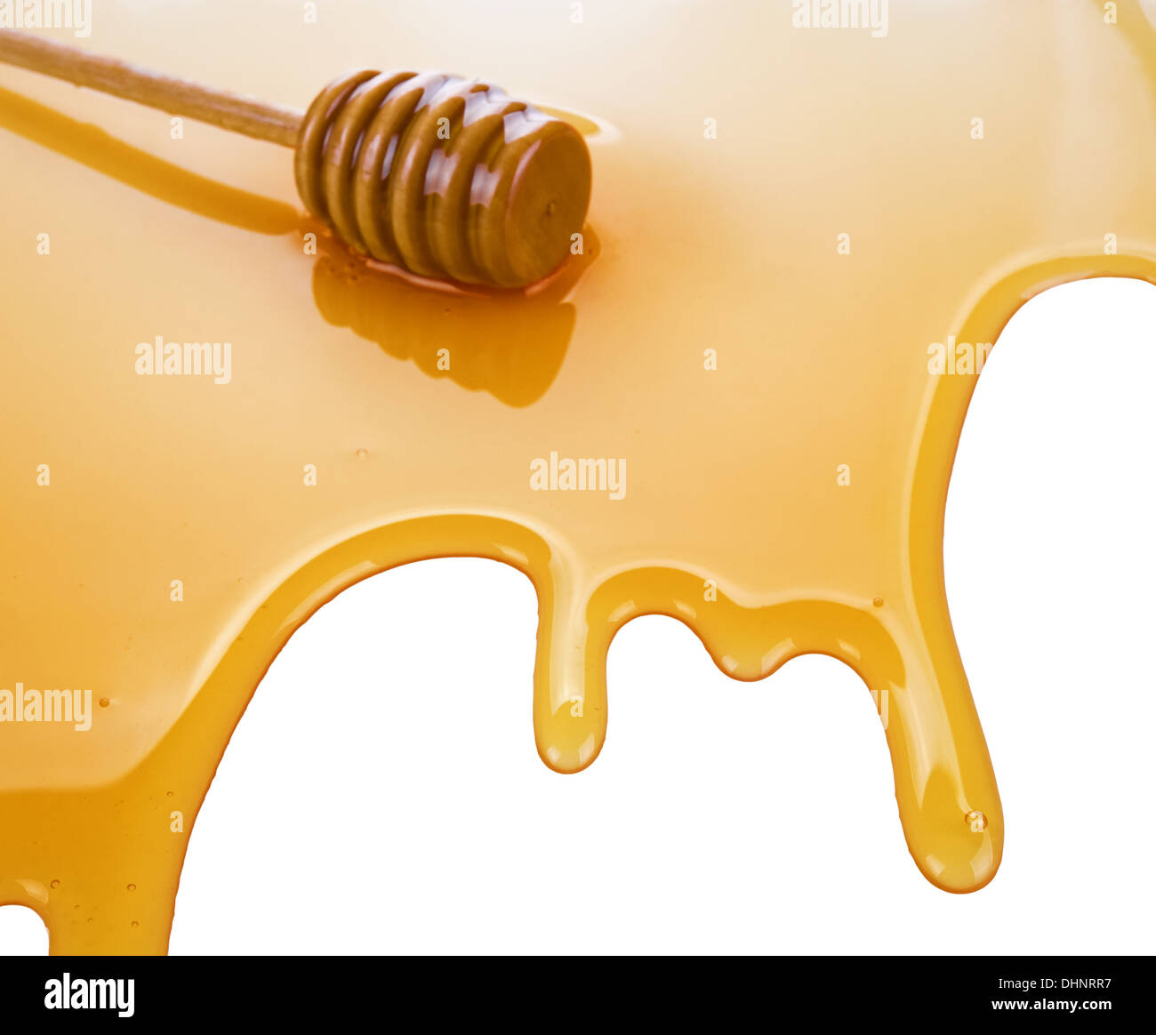 puddle of honey with wooden stick isolated on white background Stock ...