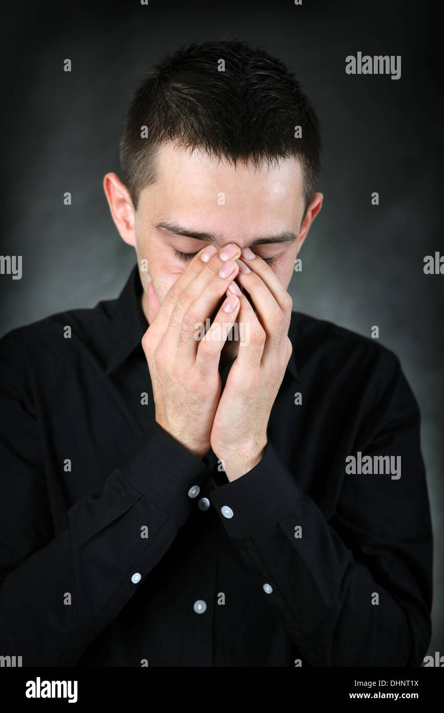 Sad young man portrait hi-res stock photography and images - Alamy