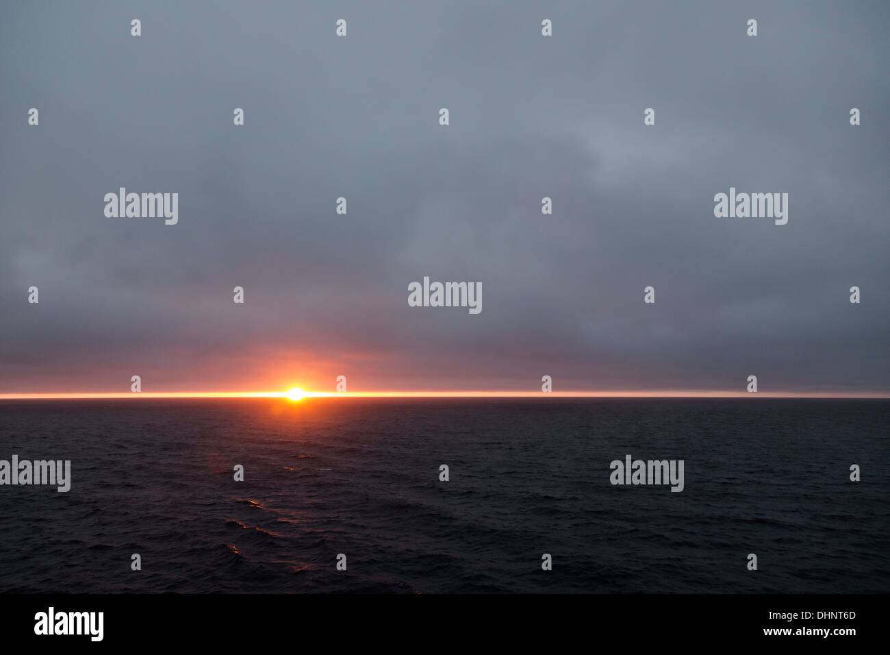 Sunset at sea Stock Photo - Alamy
