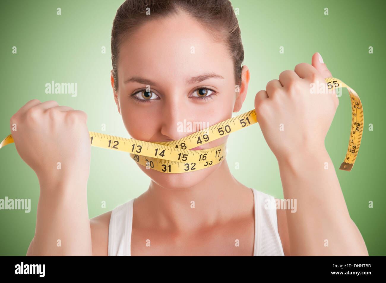 Woman tape measure mouth hi-res stock photography and images - Alamy