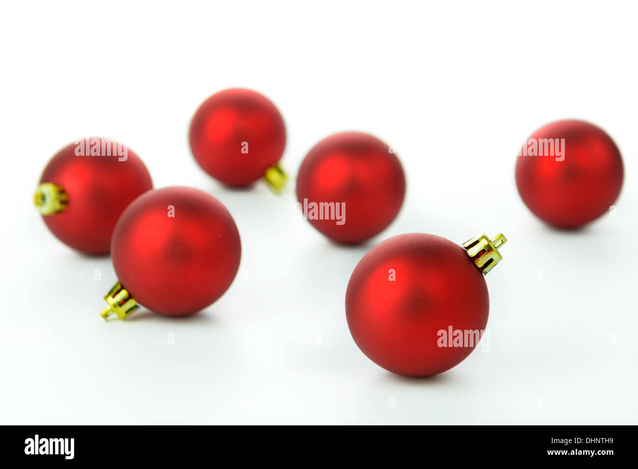 Red Christmas baubles isolated on white background Stock Photo - Alamy