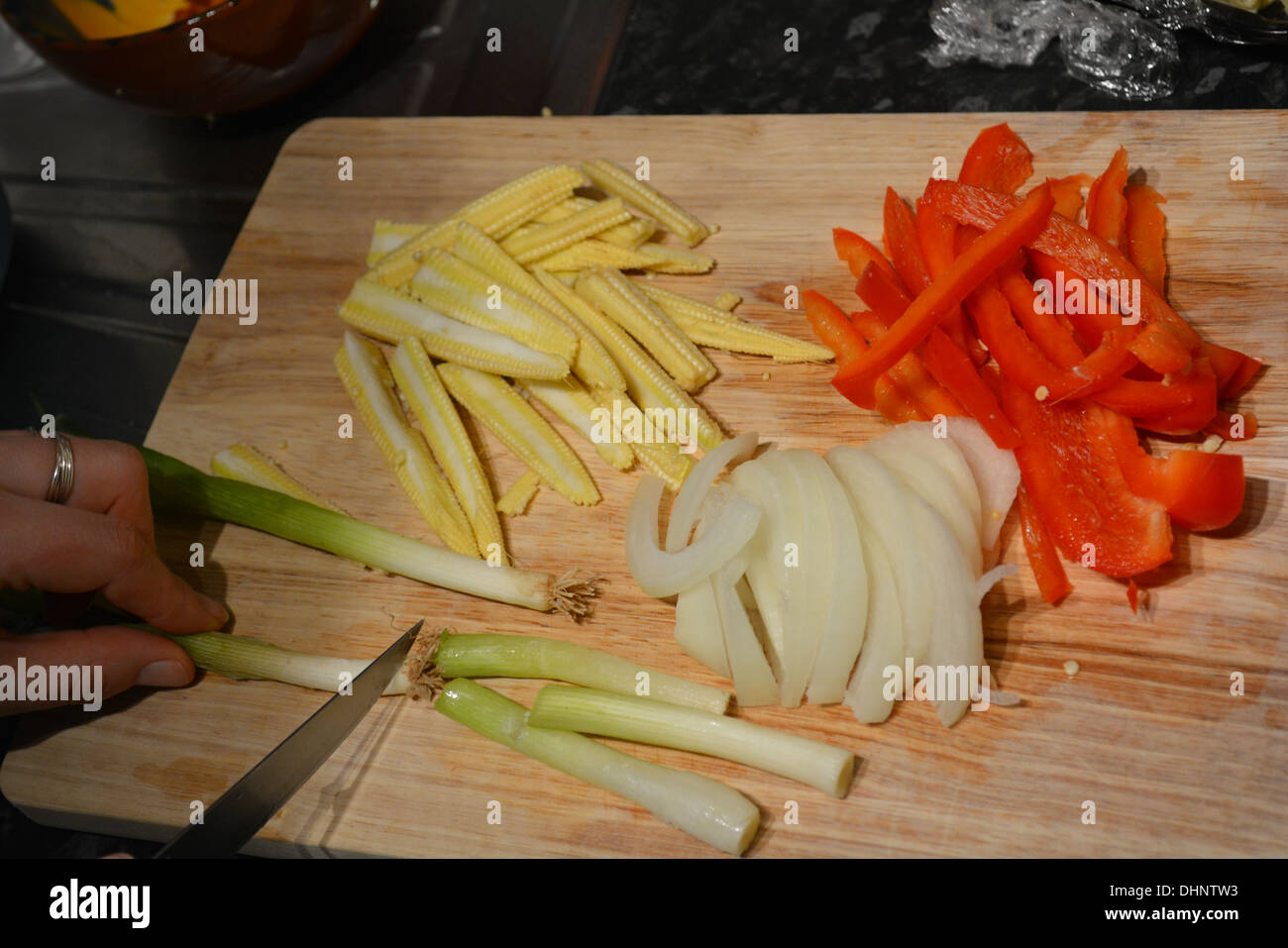 Cooking a mixture of vegetables in a wok Stock Photo - Alamy