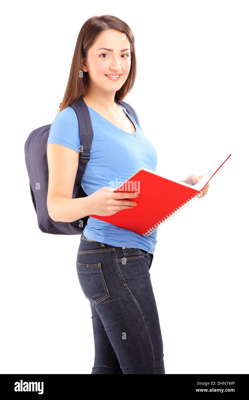 Female student with backpack holding book Stock Photo - Alamy