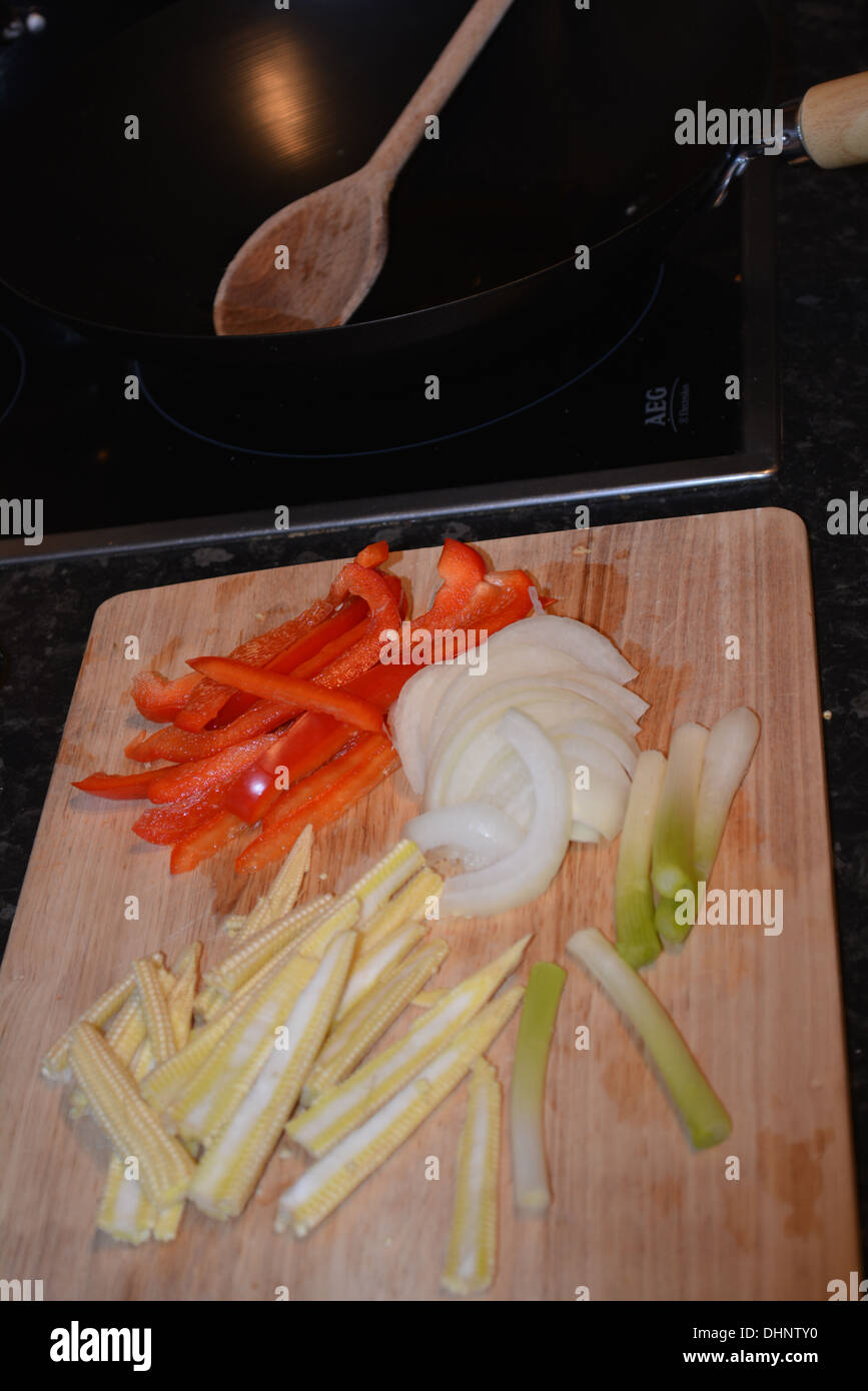 Cooking a mixture of vegetables in a wok Stock Photo - Alamy