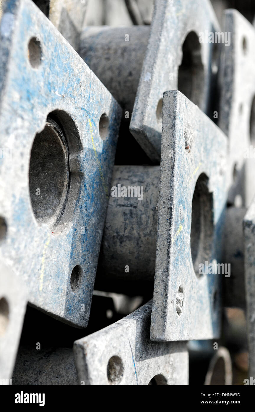 Stacked construction tubular steel props Stock Photo - Alamy