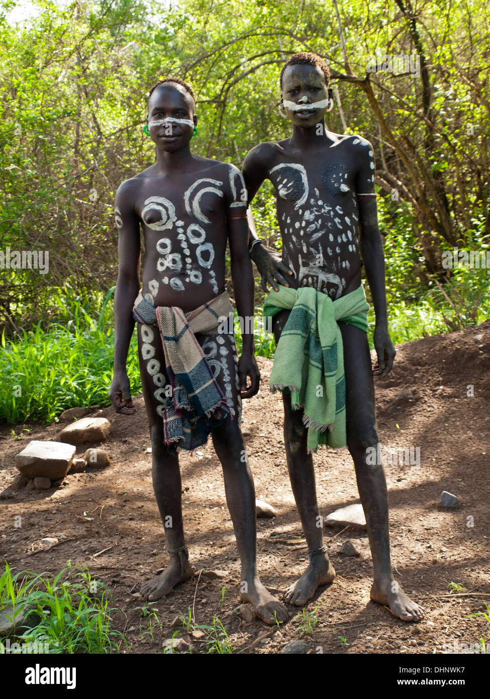 Mursi young men with painted bodies Stock Photo - Alamy