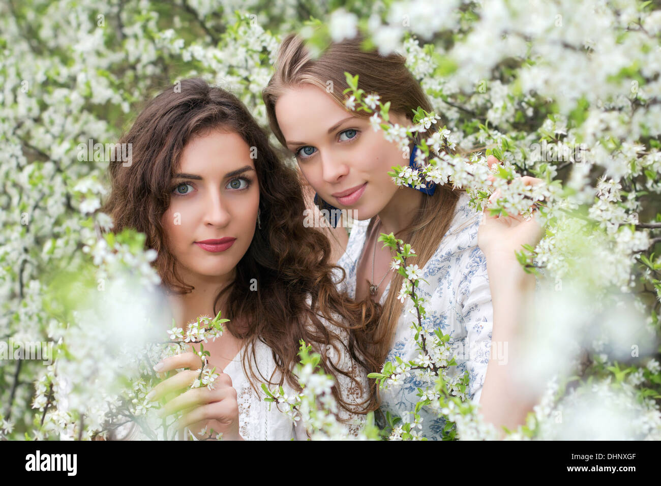 Two ladies with flowers hi-res stock photography and images - Alamy