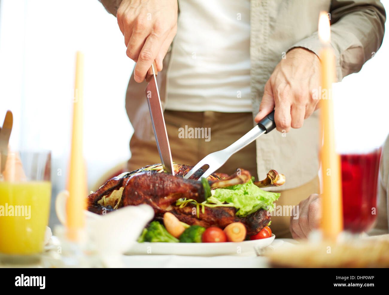 Man cut roasted chicken hi-res stock photography and images - Alamy