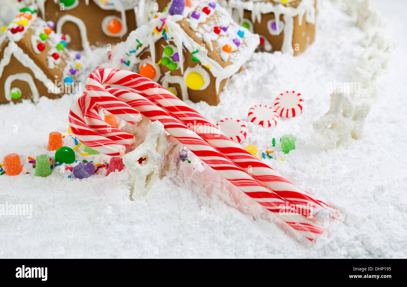 Horizontal close up photo of holiday candy canes with Gingerbread ...