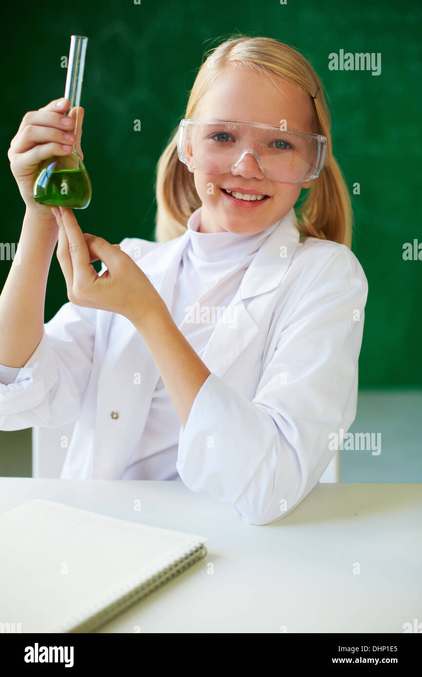 Chemist holding chemical substance camera hi-res stock photography and ...