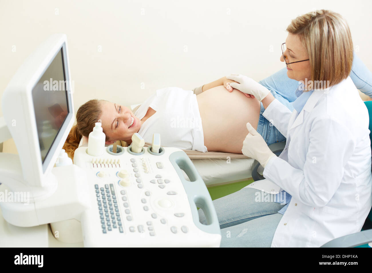 Happy young woman undergoing regular examination at hospital Stock ...
