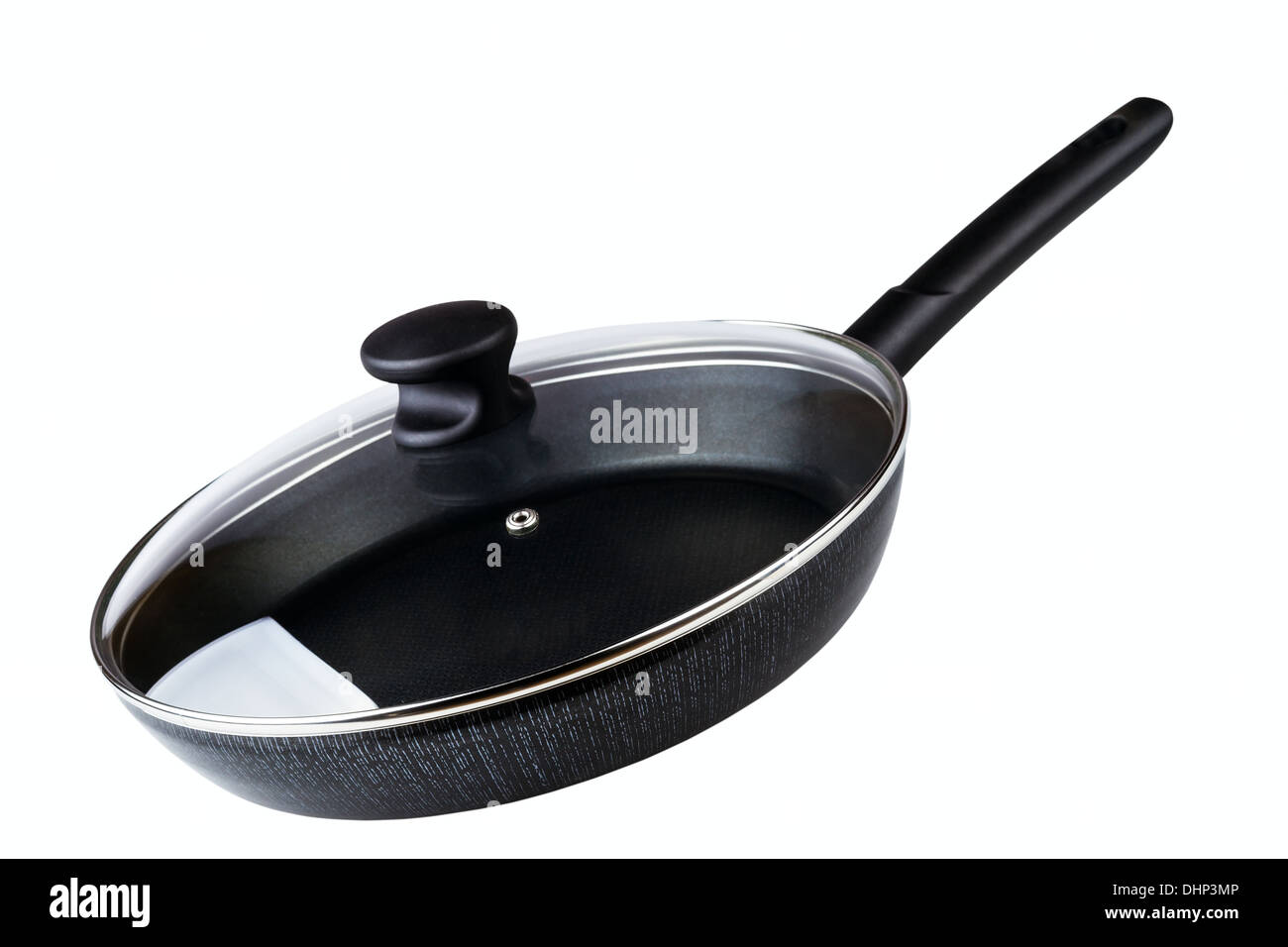 Frying pan with a teflon covering isolated on a white background Stock ...