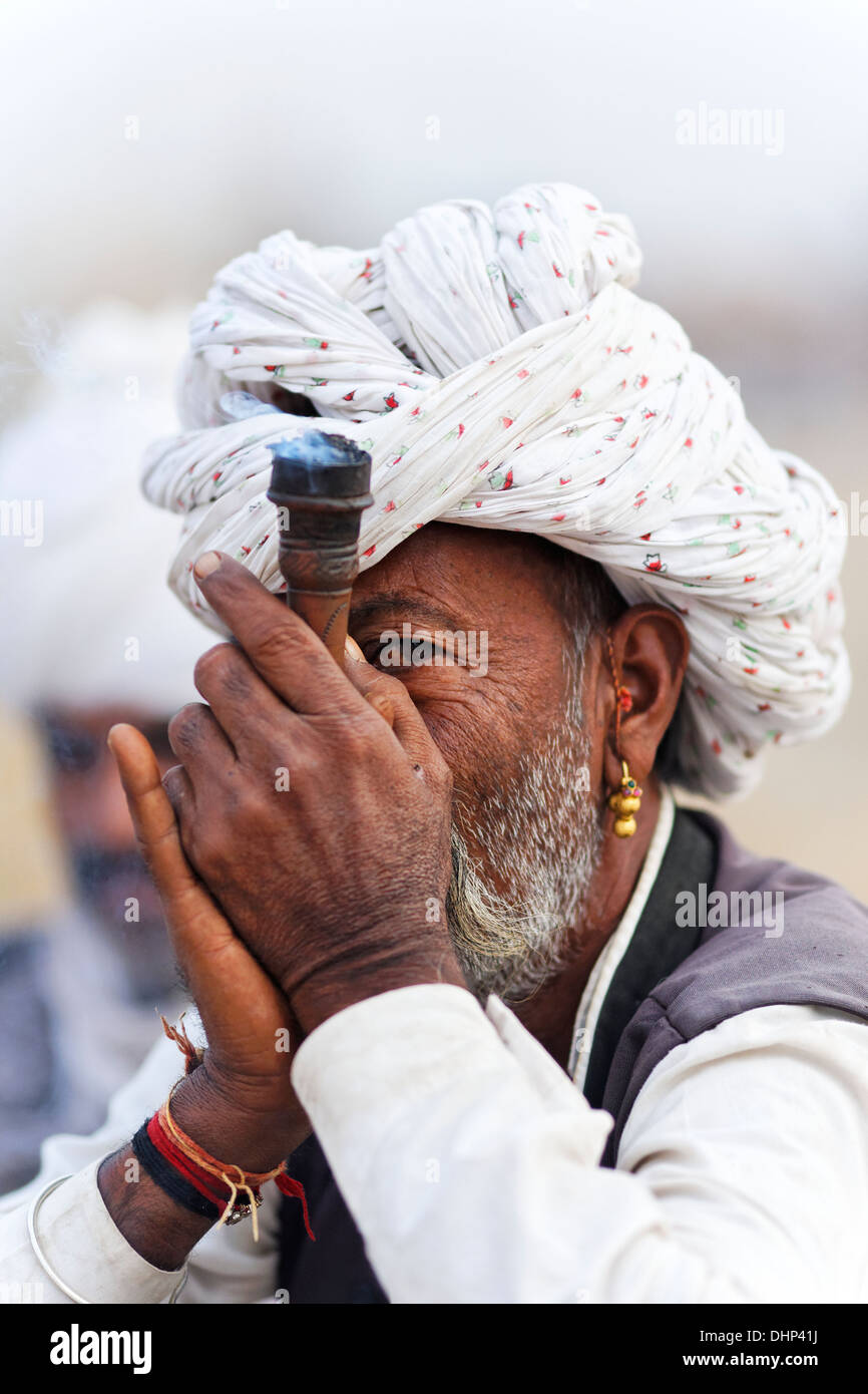 Indian Man Smoking Handmade Chillum Pipe at Pushkar camel Fair, India ...