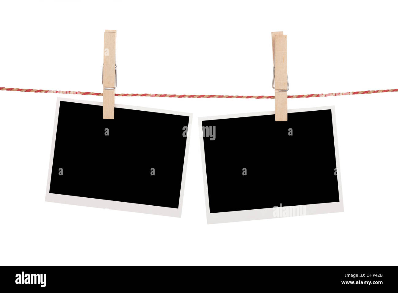 Blank photos hanging on clothesline. Isolated on white background Stock ...