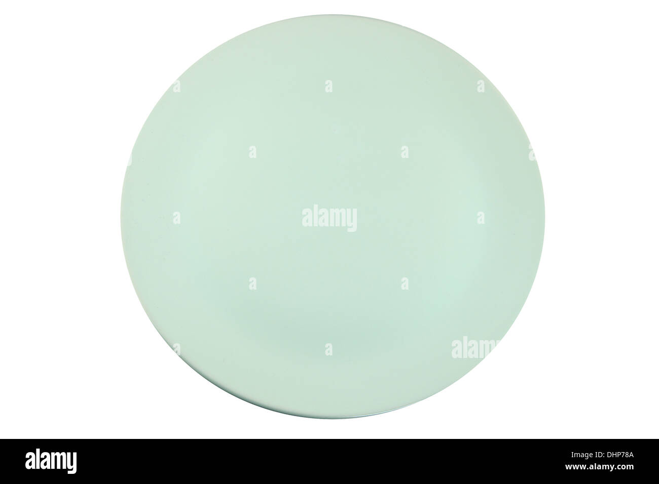 The picture closeup Green dish on white background Stock Photo - Alamy