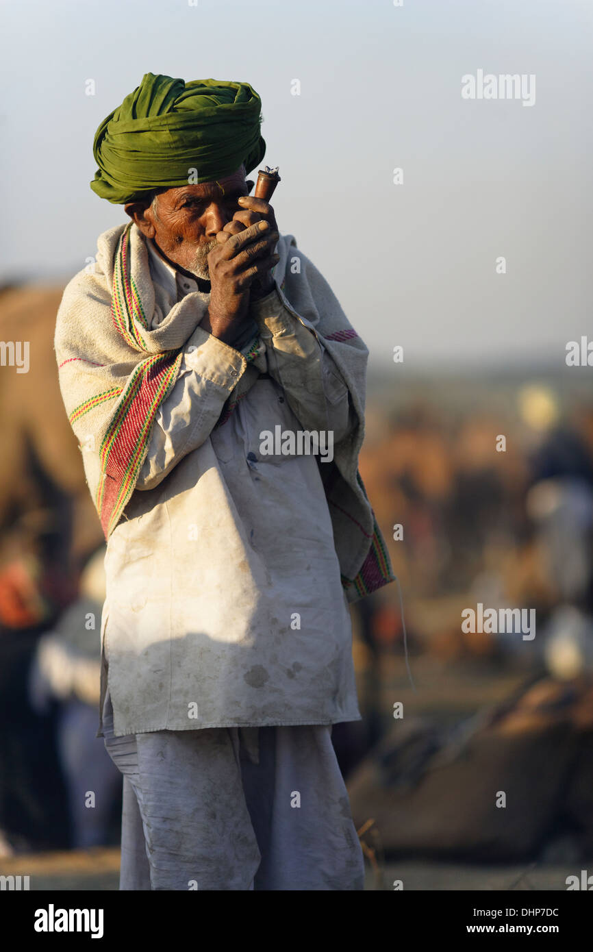 Indian Man Smoking Handmade Chillum Pipe at Pushkar camel Fair, India ...