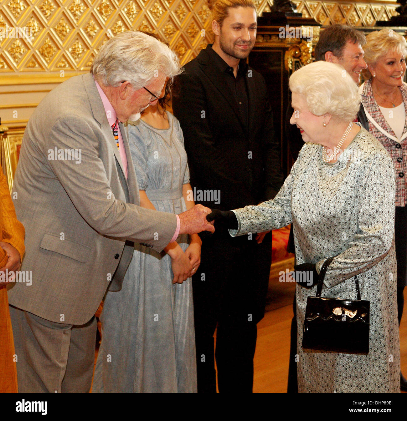 Queen Elizabeth II meets Rolf Harris Queen Elizabeth II attends a tea ...