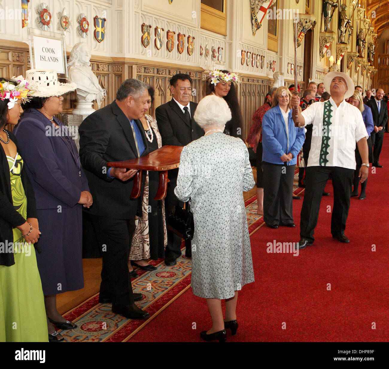 Queen Elizabeth II is presented with a Throne from the Cook Islands ...