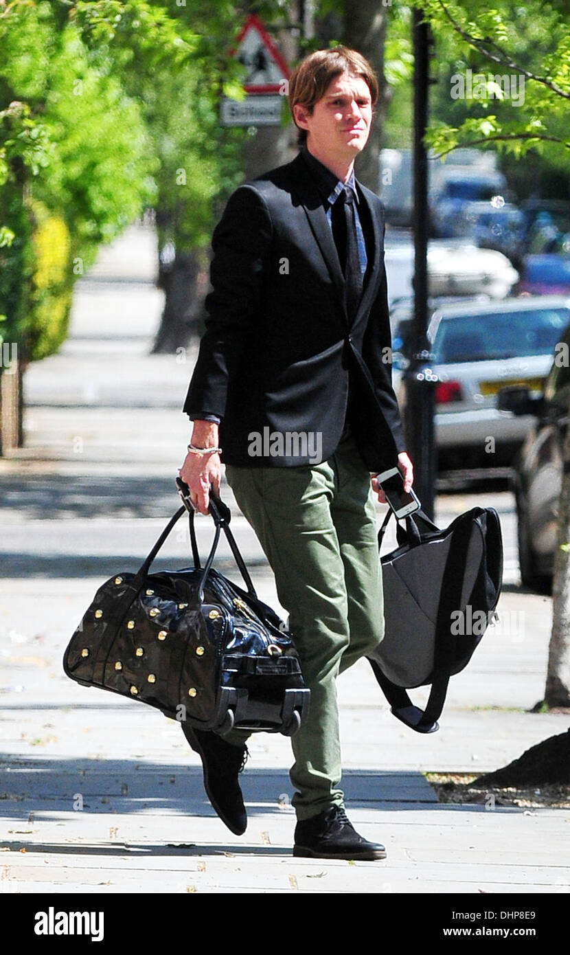 Jesse Wood leaving Fearne's home to attend the wedding of McFly's Tom ...