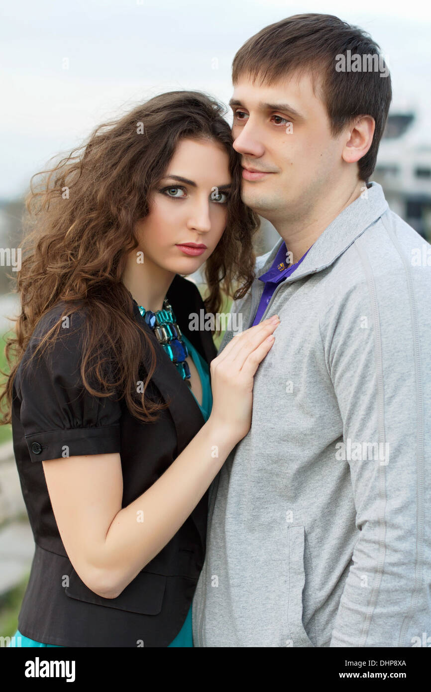 Lady hugging man Stock Photo - Alamy