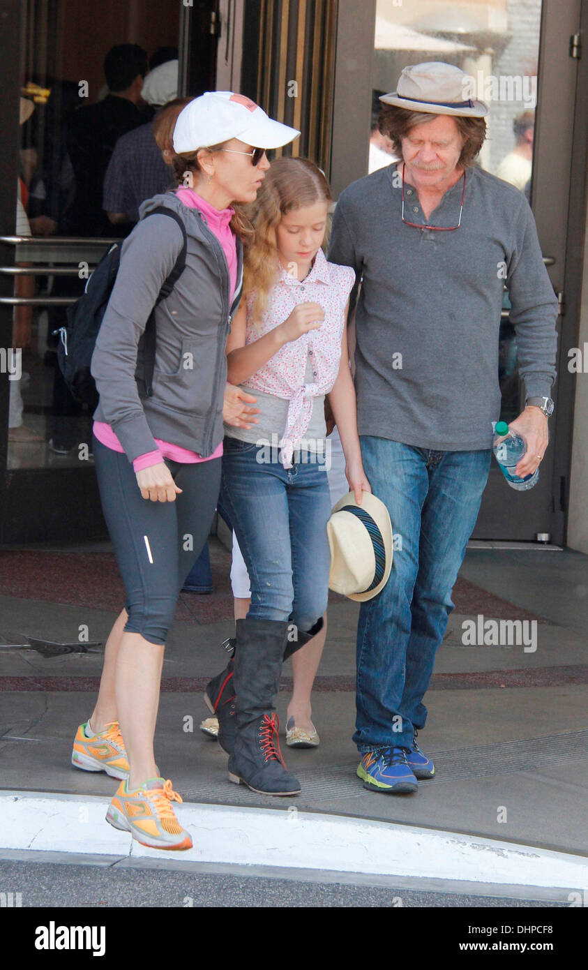 Felicity Huffman and William H. Macy leaving the movie theatre with their daughters at The Grove ...