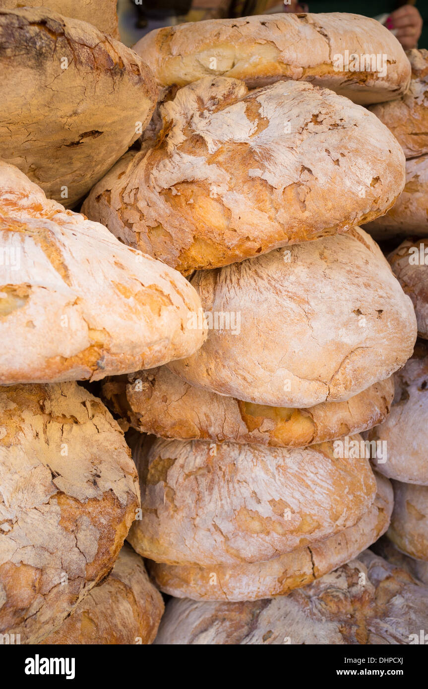 A pile of freshly baked bread on a market stall Stock Photo - Alamy