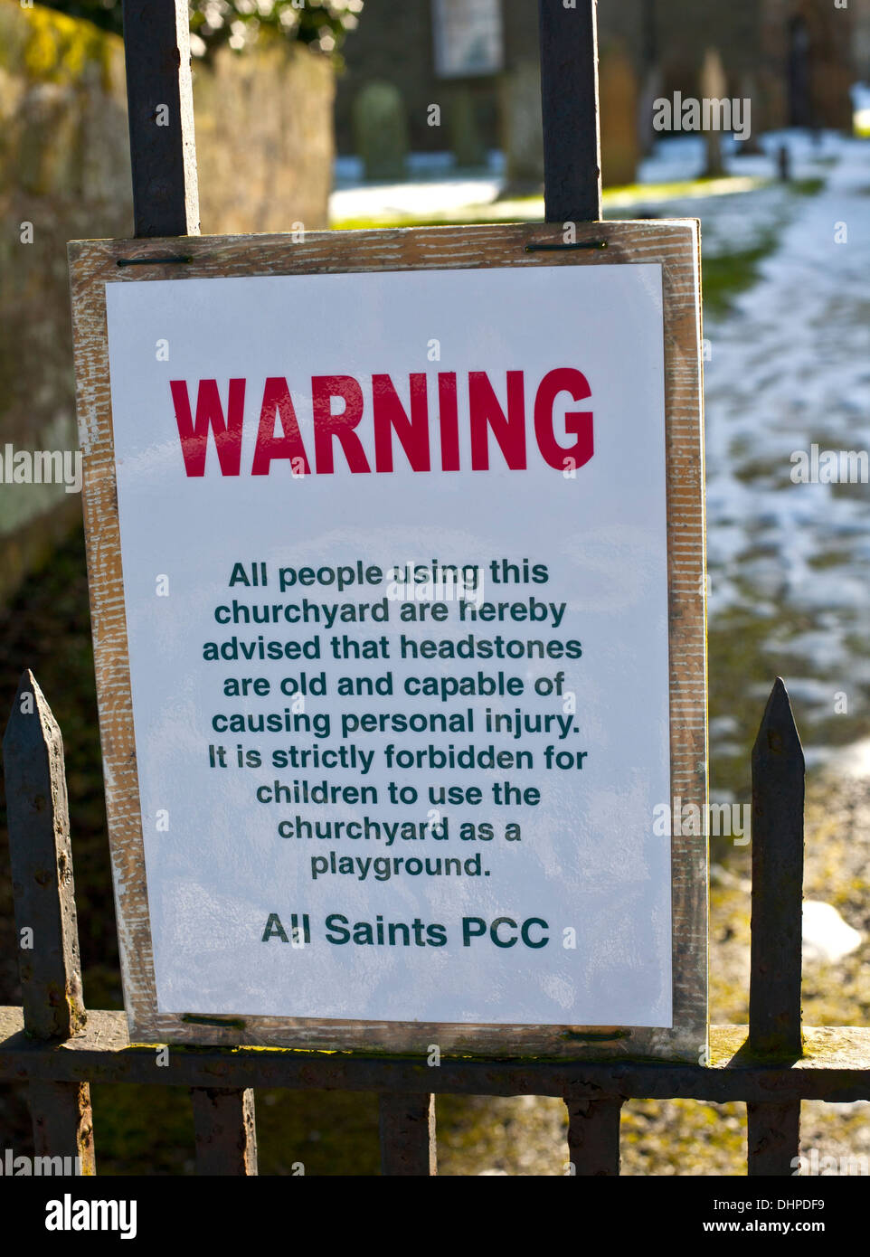 Churchyard warning sign Stock Photo - Alamy