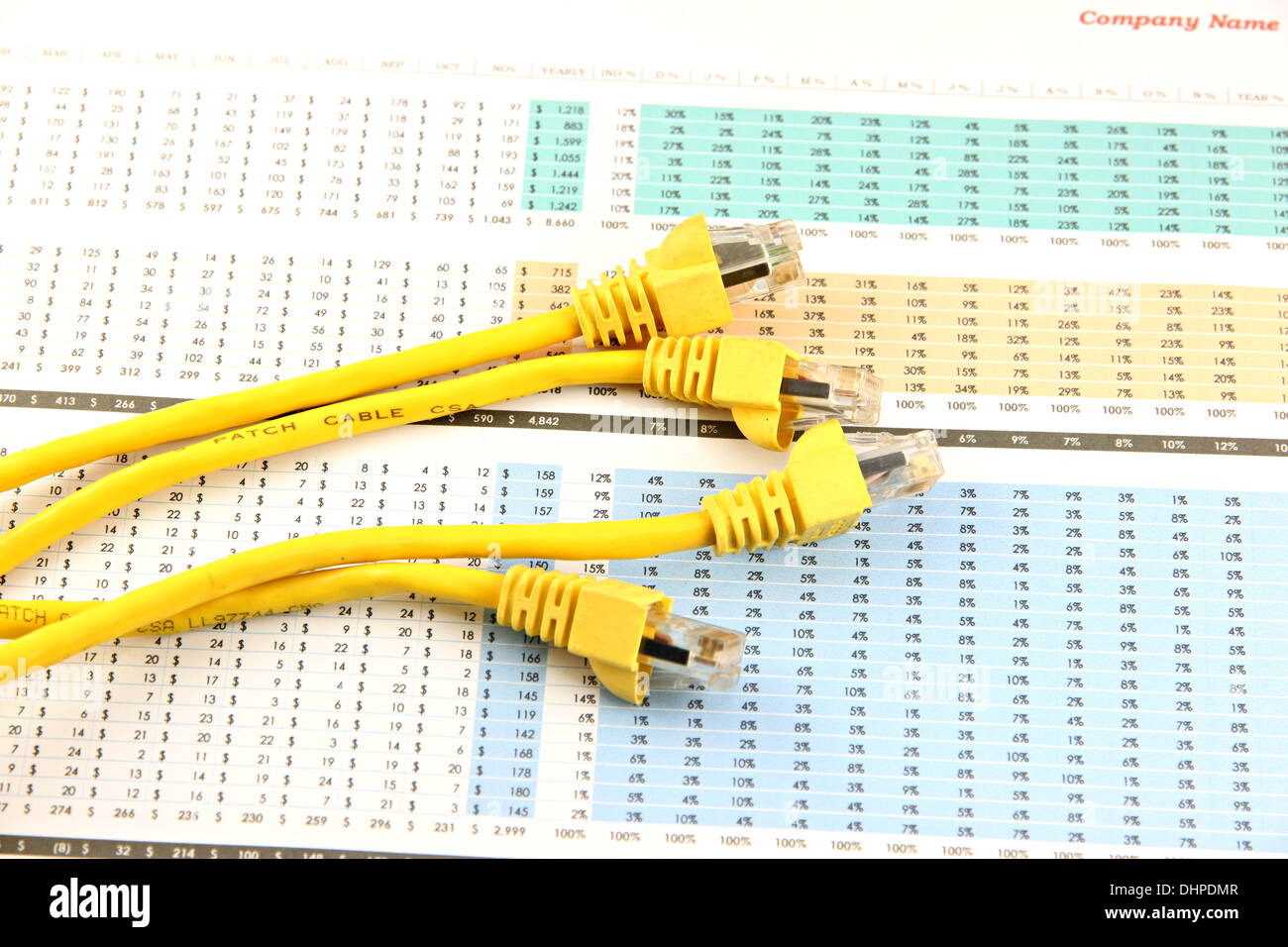 Yellow LAN Cables on Business graph Stock Photo - Alamy