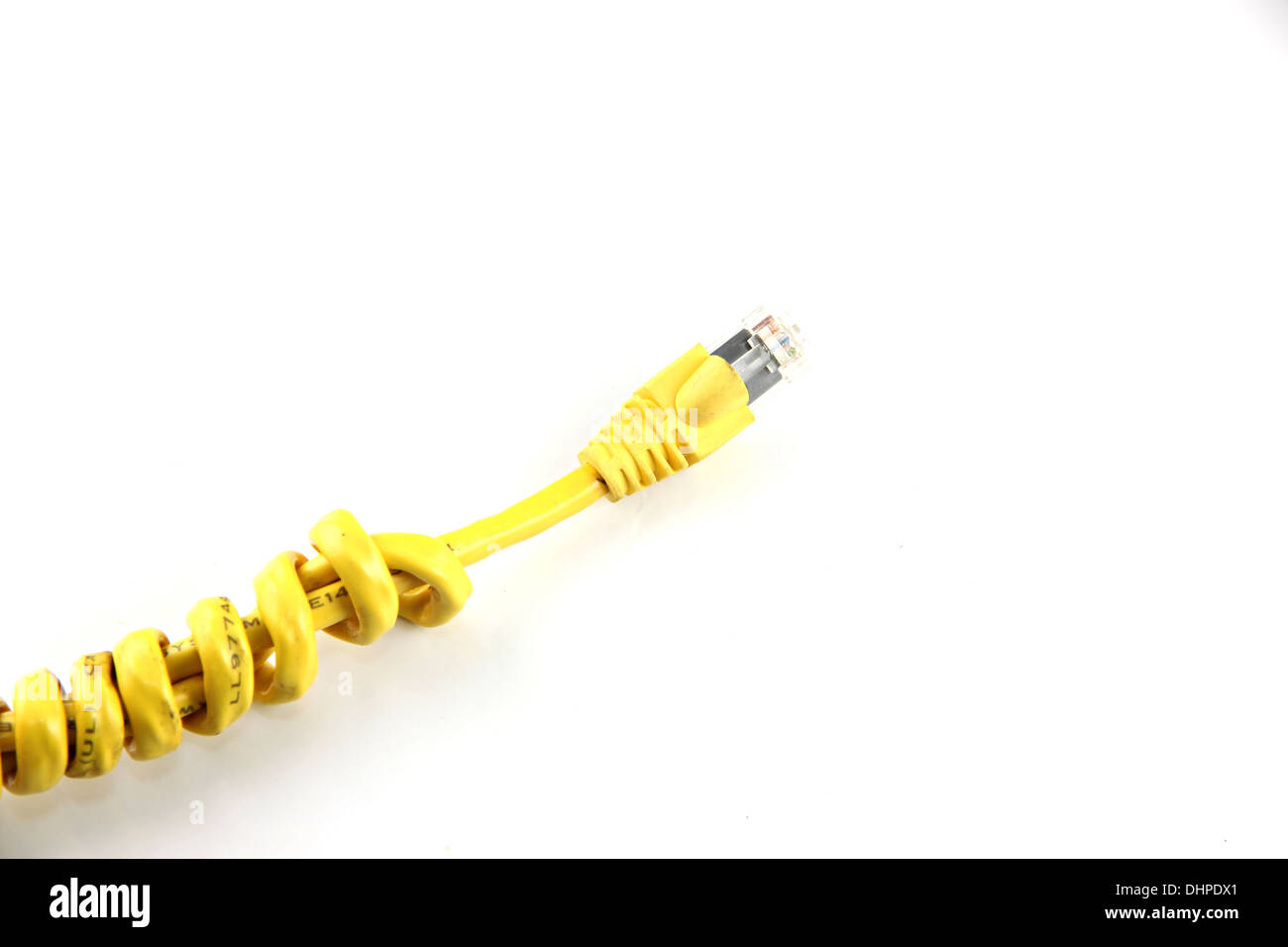 Three Yellow LAN Cables on white background Stock Photo - Alamy