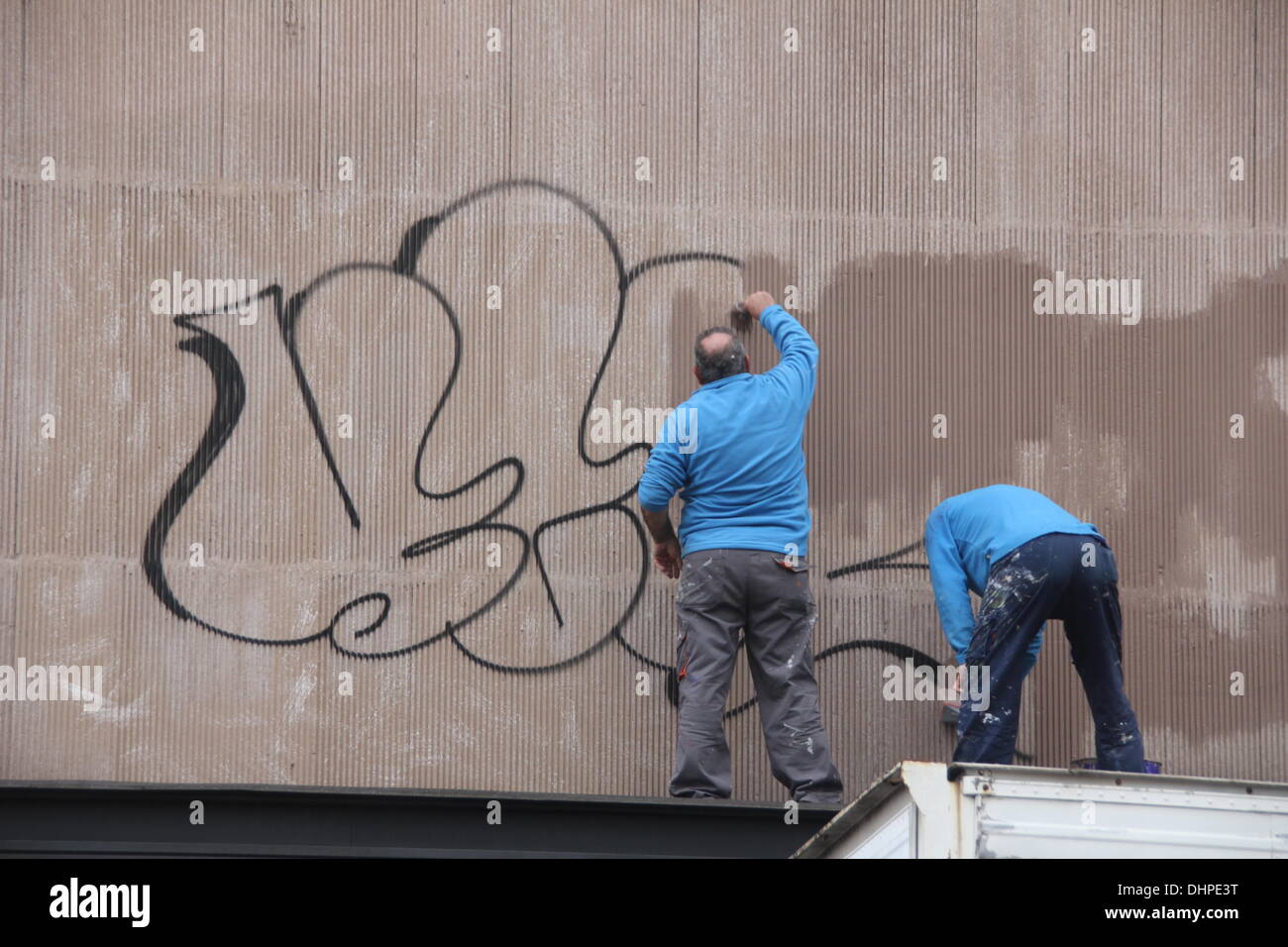 Painting over covering graffiti hi-res stock photography and images - Alamy