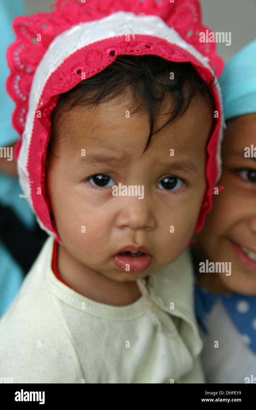 Traditional baby and girl in Samarkand, Uzbekistan Stock Photo - Alamy