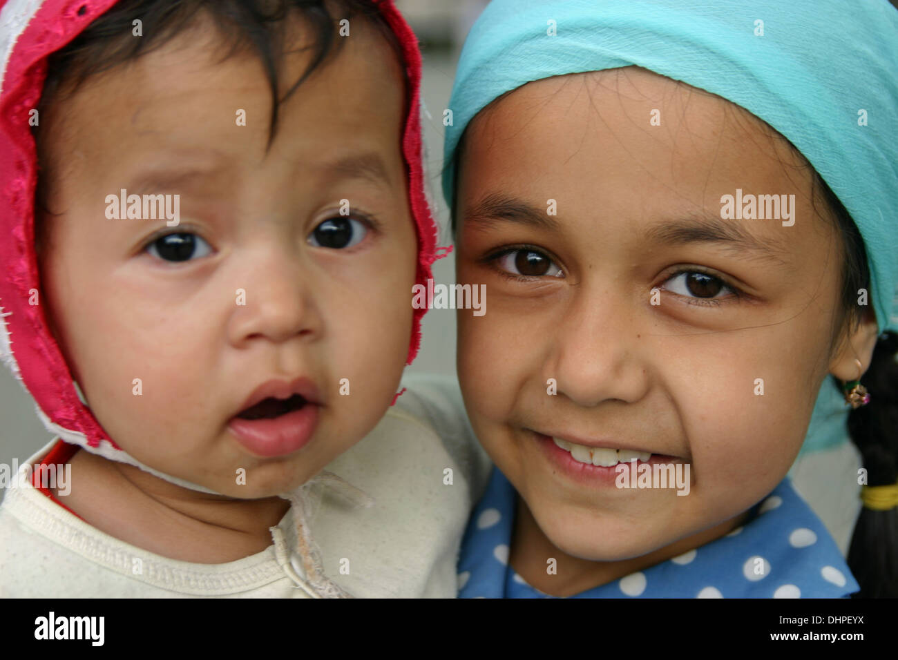 Traditional baby and girl in Samarkand, Uzbekistan Stock Photo - Alamy