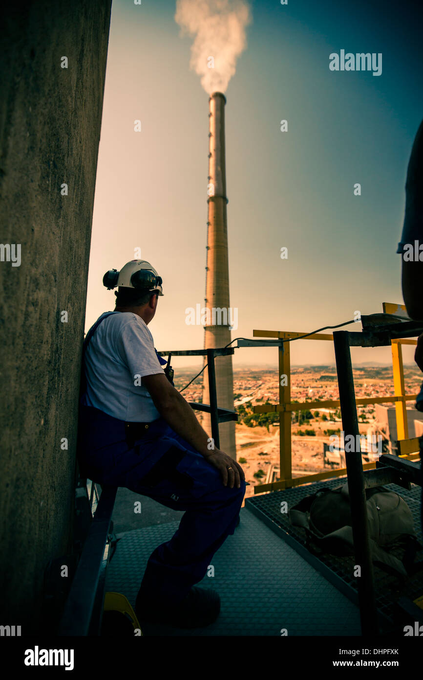 Engineer of Power Plant looking away from the top of Stack Stock Photo ...