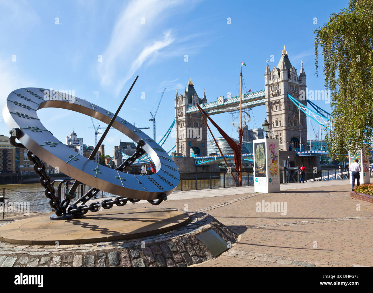 Sundial at St Katharine's Dock with Tower Bridge behind Stock Photo - Alamy